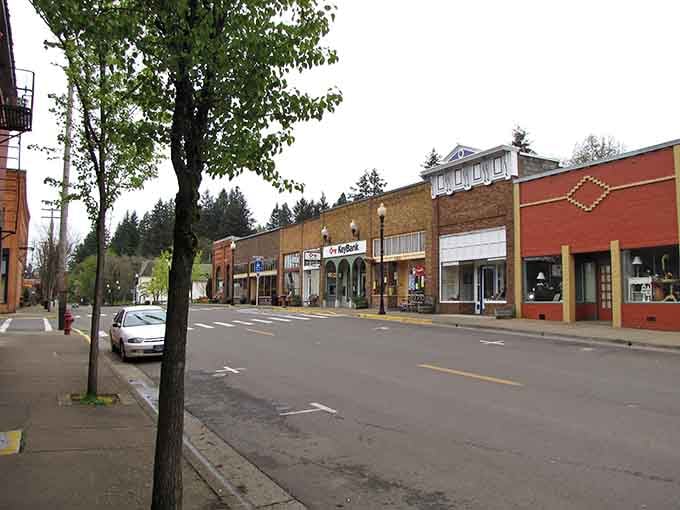 Historic buildings line the street like a perfectly preserved time capsule that still functions as actual commerce.