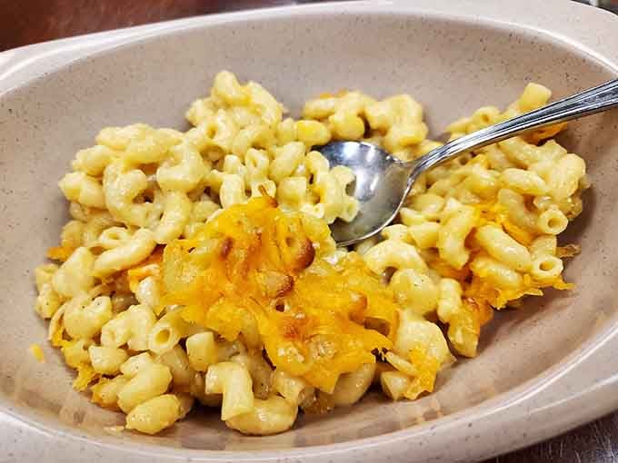 Mac and cheese so creamy and golden, it makes that blue box stuff seem like a personal betrayal.