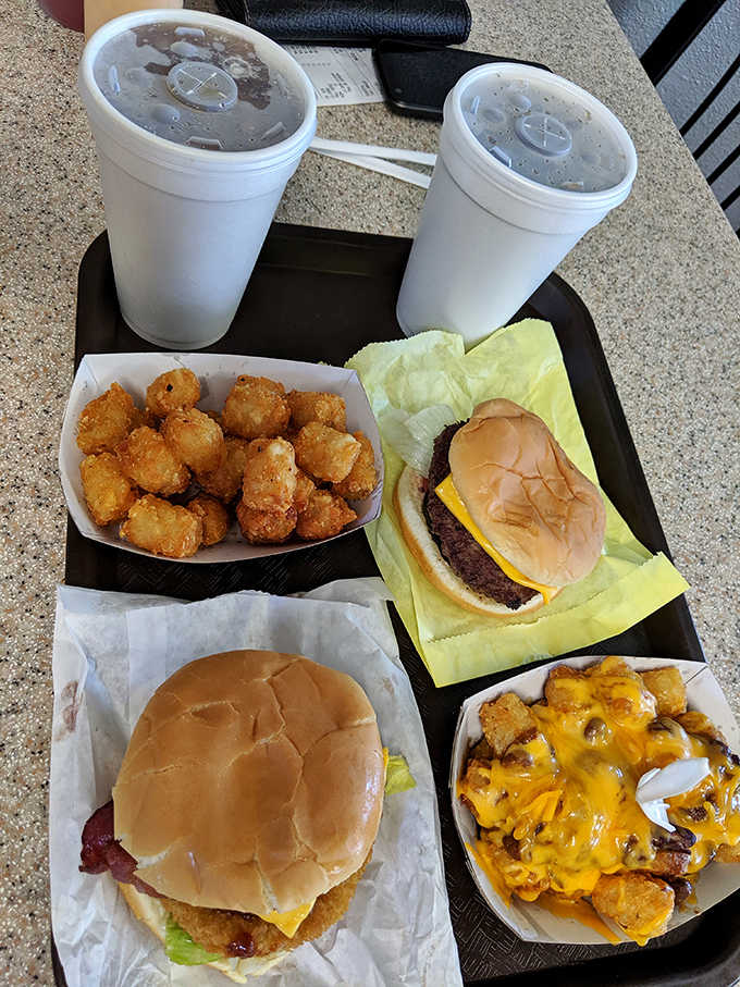 This spread includes tater tots, burgers, shakes, and chili cheese fries, also known as the four food groups.