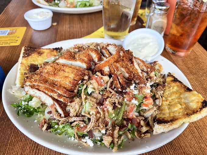The Red Bird Fried Chicken Salad proves that healthy eating and fried chicken can coexist in beautiful, delicious harmony.