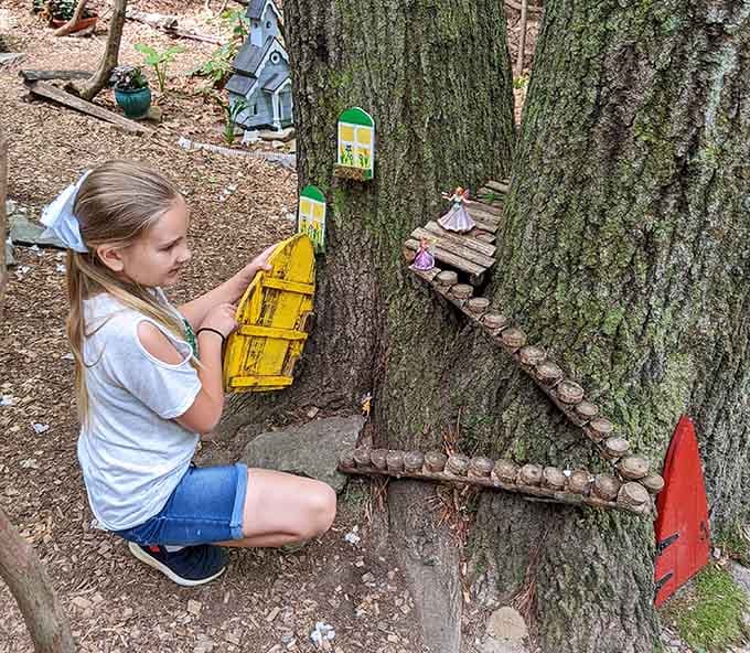 When even the tree trunks get their own tiny apartments, you know you've entered serious fairy territory.