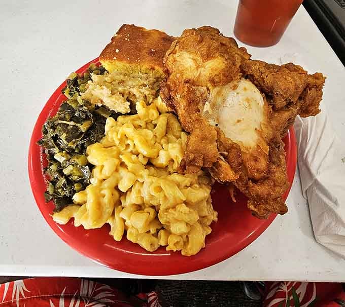 Golden fried chicken, creamy mac and cheese, and cornbread form the holy trinity of Southern buffet perfection.