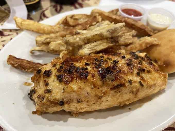 Seasoned grilled salmon with cheese grits delivers coastal flavors deep in the Georgia countryside.