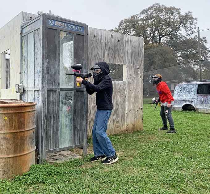 Taking cover behind weathered wood barriers, living out action movie fantasies without the Hollywood stunt coordinator.