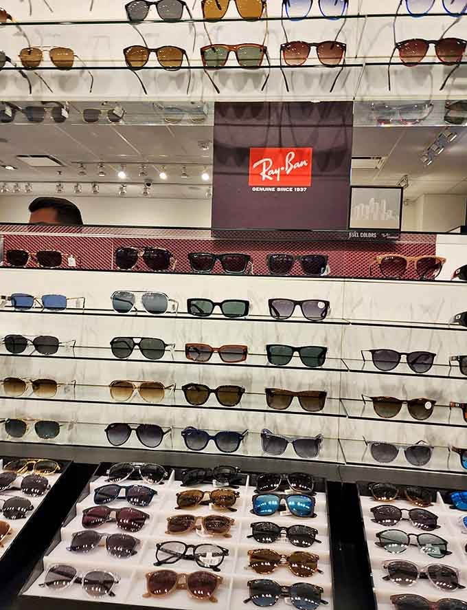Ray-Ban sunglasses lined up like soldiers, protecting eyes and egos since your parents were young and cool.