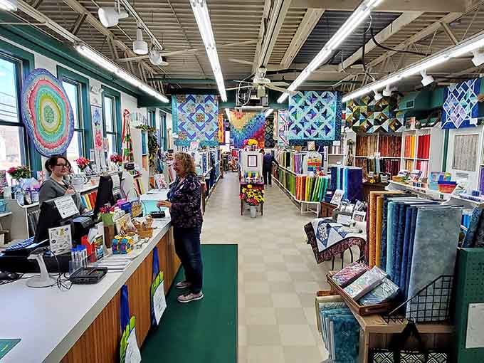 Colchester Mill Fabrics & Quilting is a crafter's paradise where fabric bolts outnumber your retirement planning spreadsheets, gloriously.