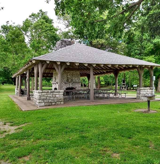 Stone shelter meets riverside dining where your potato salad gets a view better than most restaurants charge for.
