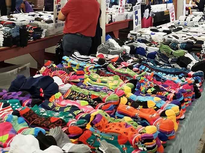 This sock explosion looks like a rainbow had a yard sale, and honestly, your feet deserve this much joy.