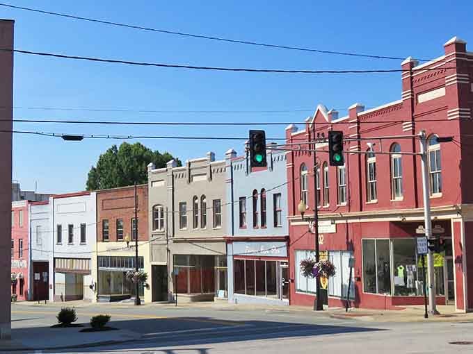 These colorful storefronts line up like a rainbow of possibilities, each building telling its own story in brick and paint.