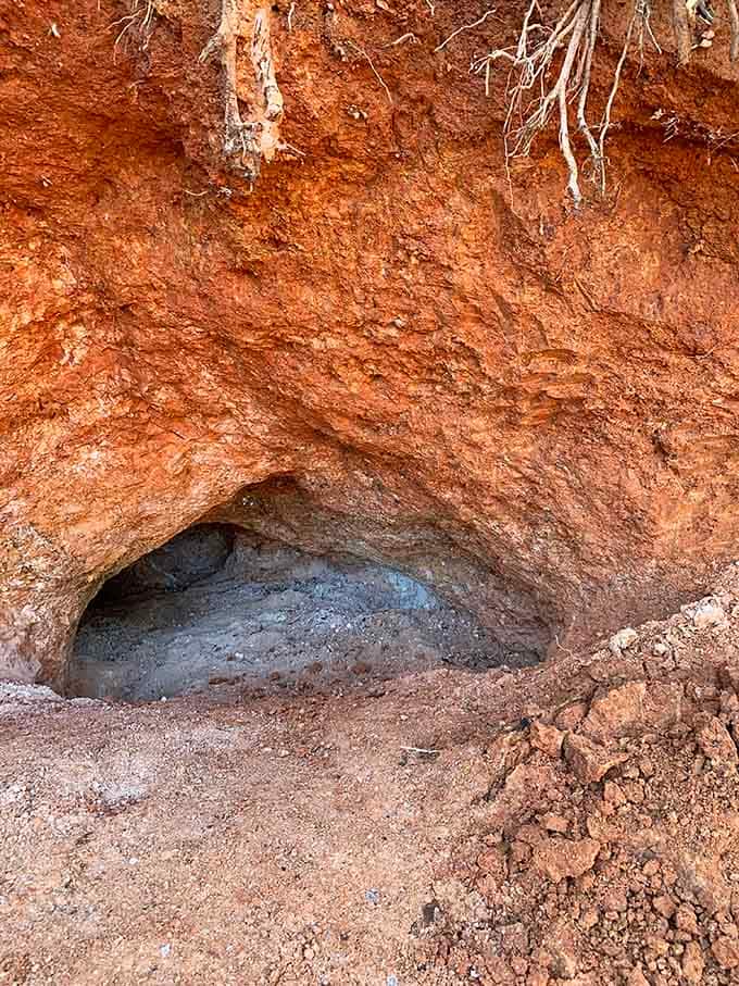 This mysterious cavern in the clay wall whispers promises of crystals just waiting to be discovered.