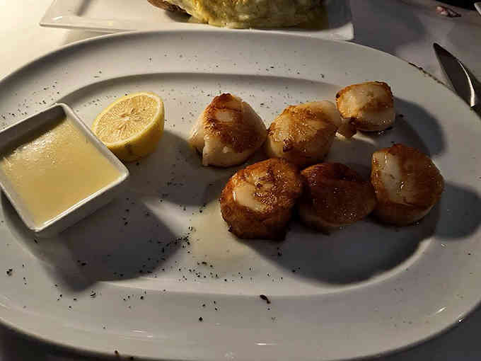 Scallops seared to golden perfection, sweet and tender enough to convert even the most devoted landlubbers to seafood lovers.