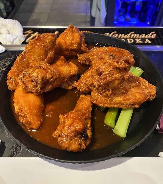Hot and honey wings strike that magical balance between fire and sweetness, like a delicious culinary tightrope walk you'll want to repeat.