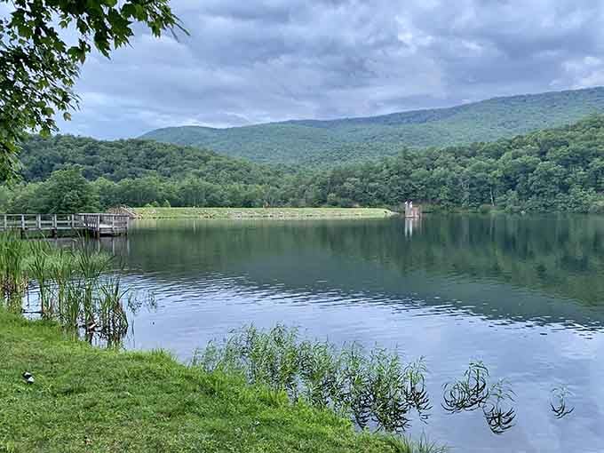 Mirror-like reflections on Douthat Lake make you wonder if you're looking at water or a postcard come to life.