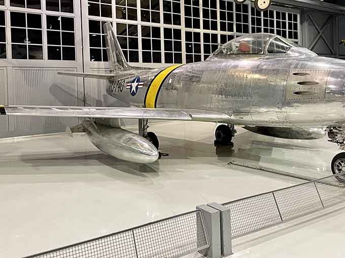 This jet fighter looks fast just sitting still, ready to break sound barriers from its museum perch.