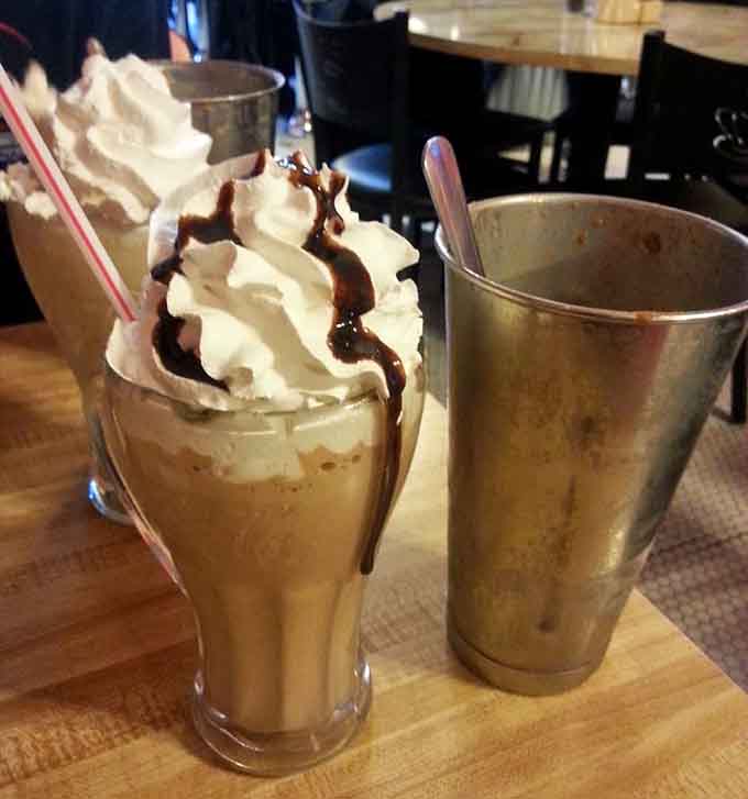 Peanut butter and chocolate unite in this towering shake that comes with its own mixing tin of backup.