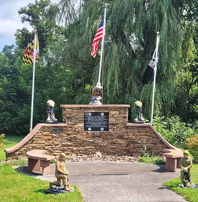 This memorial honors those who served, standing proud beneath flags that flutter in mountain breezes.