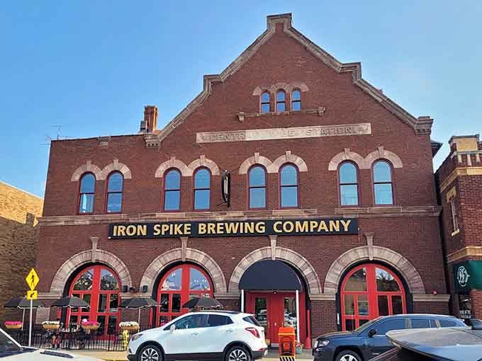 Iron Spike Brewing Company occupies a building that's seen more history than most textbooks can cover.