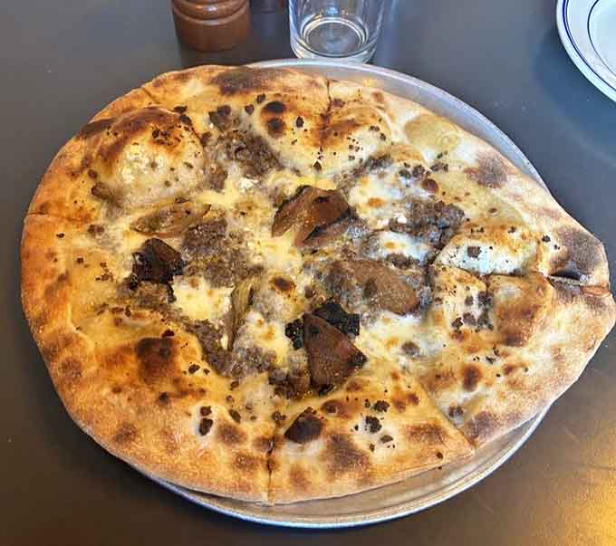 Bison sausage on pizza might sound adventurous, but one bite makes you wonder why everywhere doesn't do this.