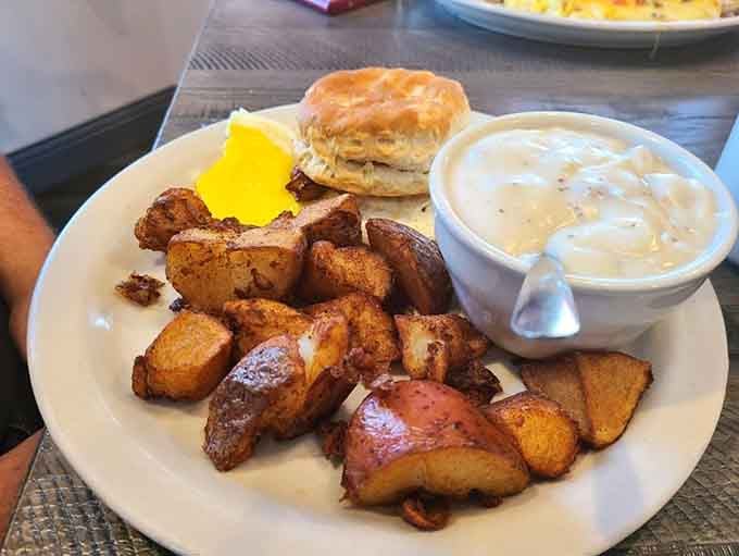 Those golden potatoes and fluffy biscuits prove that sometimes the simplest combinations create the most memorable mornings.