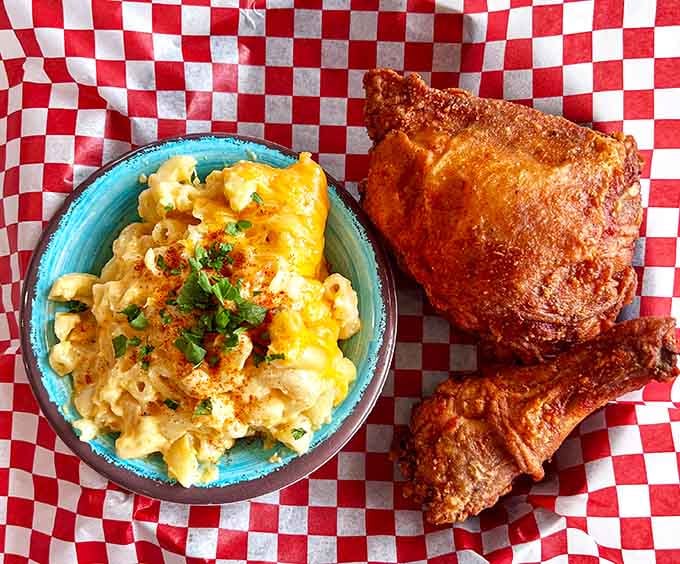 Fried chicken meets creamy mac and cheese in a pairing more iconic than any dynamic duo you can name.