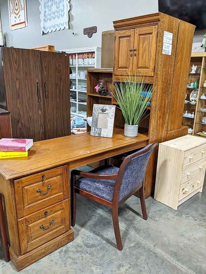 That solid wood desk is just waiting for someone to give it new life in a home office or craft room.