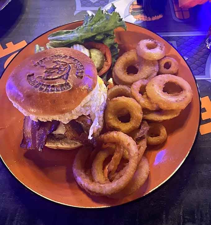 The Zombie Burger arrives looking deliciously alive, topped with ingredients that would satisfy even the most demanding undead appetite.