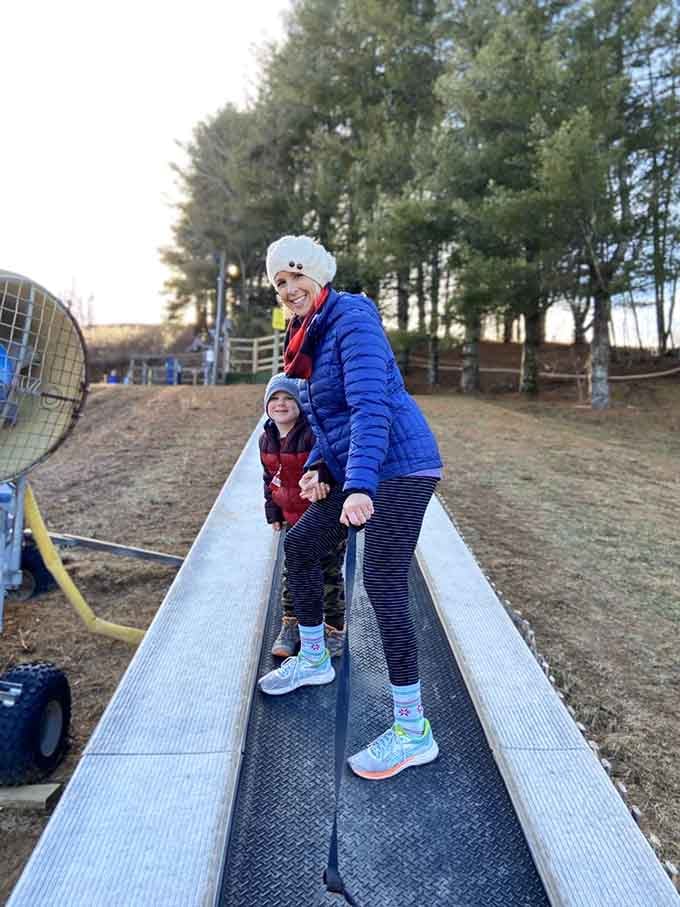 That conveyor belt is basically a magic carpet that eliminates the worst part of sledding: the climb back up.