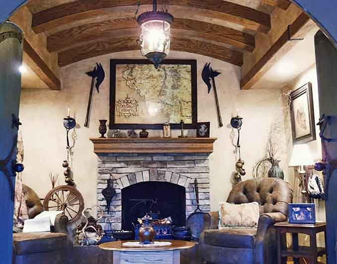 A stone fireplace anchors this living space where you'll want to spend hours doing absolutely nothing.