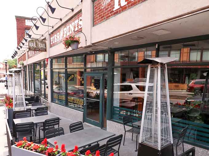 Rail Trail Flatbread Co. welcomes you with outdoor seating that practically begs for lingering over wood-fired pizza.