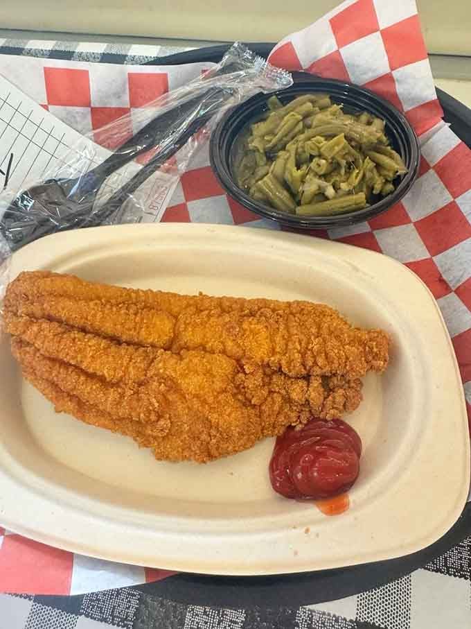 Fried catfish strips this perfectly golden deserve their own standing ovation, preferably before you devour them with green beans.