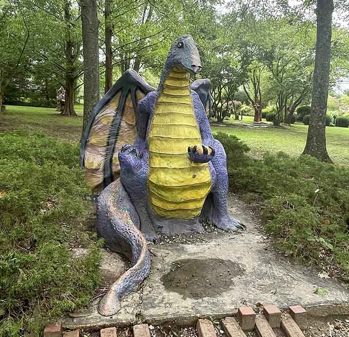 With its bright yellow belly and purple scales, this sitting dragon looks ready to share ancient wisdom or maybe just a good joke.