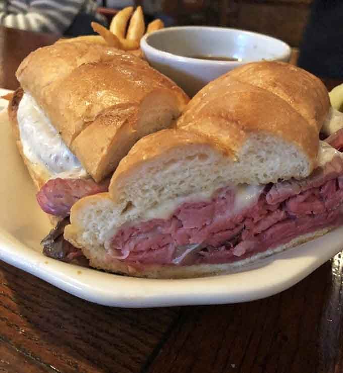 The prime rib French dip turns Sunday's star into a handheld masterpiece that requires extra napkins.