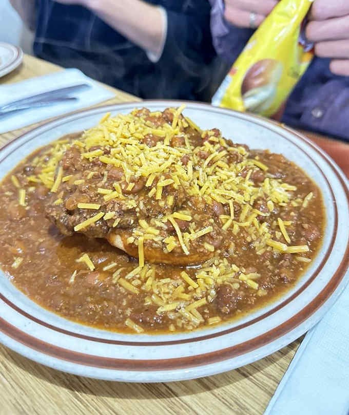 That chili burger topped with shredded cheese is comfort food that doesn't apologize for being indulgent.