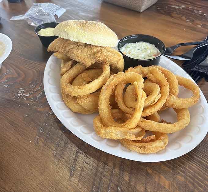 That perch sandwich with onion rings is basically a love letter to anyone who appreciates perfectly fried fish.