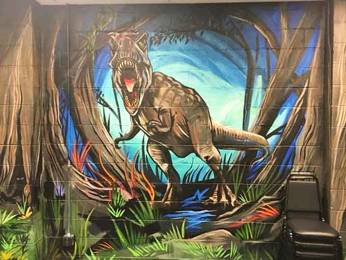 That T-Rex mural roars with vibrant detail, turning a simple wall into a window to the Cretaceous Period.