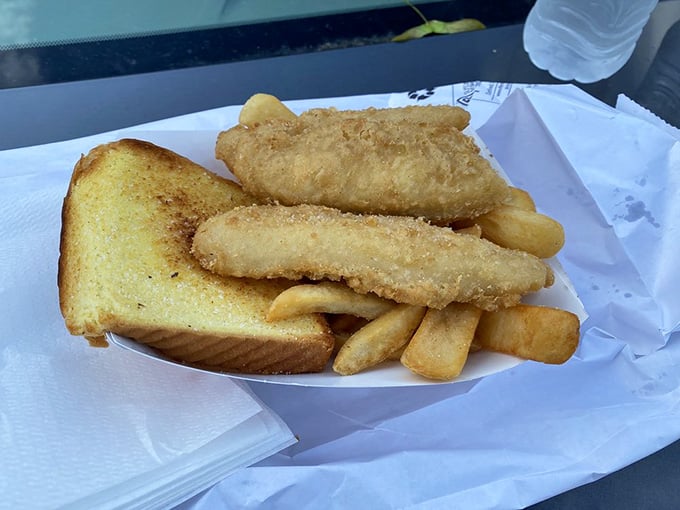 Fish and chips with Texas toast because someone understood that carbs plus carbs equals pure joy.