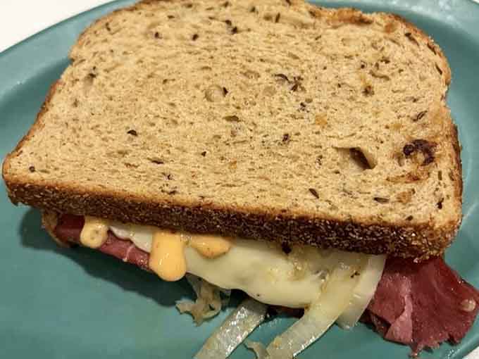 This Reuben on marbled rye is the kind of sandwich that makes you understand why delis are sacred spaces.