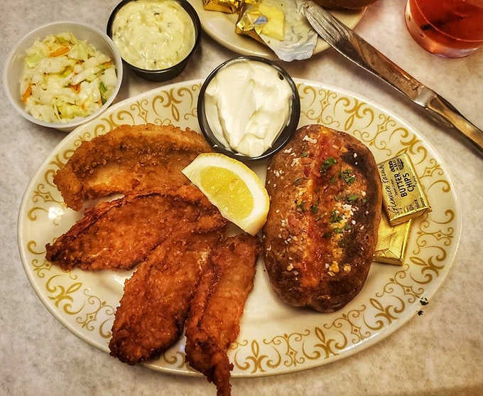 Lake perch never looked so good, crispy and golden with a lemon wedge ready for its close-up.