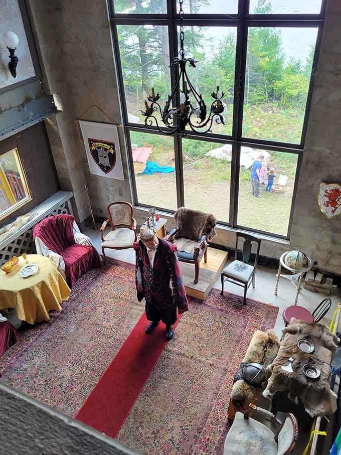Looking down from the upper gallery, you can watch the castle come alive with visitors exploring every medieval corner.
