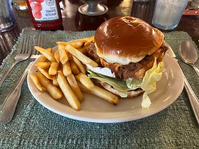 A burger this substantial requires both hands and possibly a strategic eating plan before diving in headfirst.