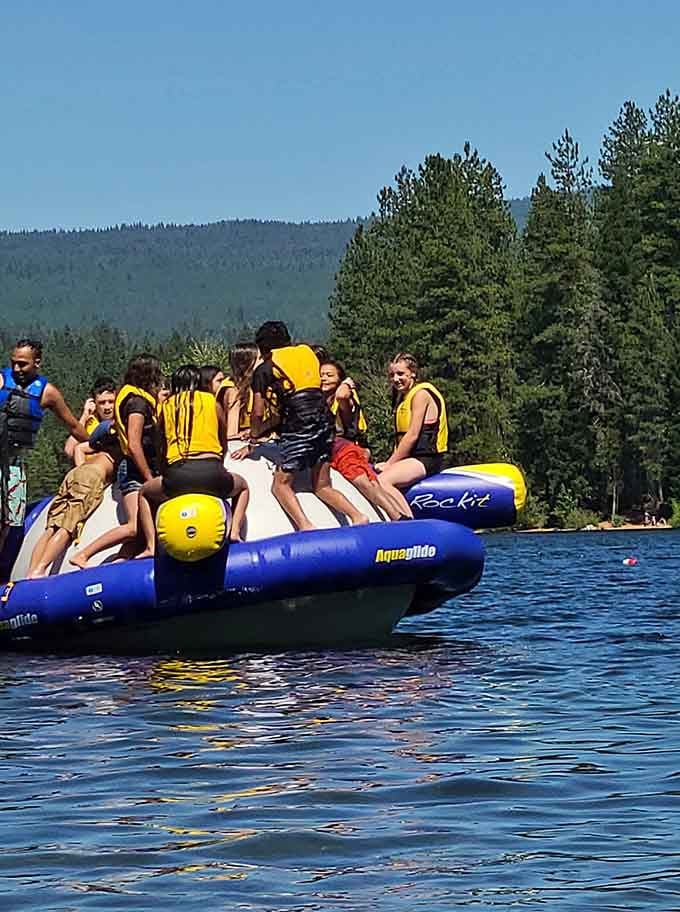 Watching families tackle the floating challenge together proves laughter is still the best life jacket you can wear.