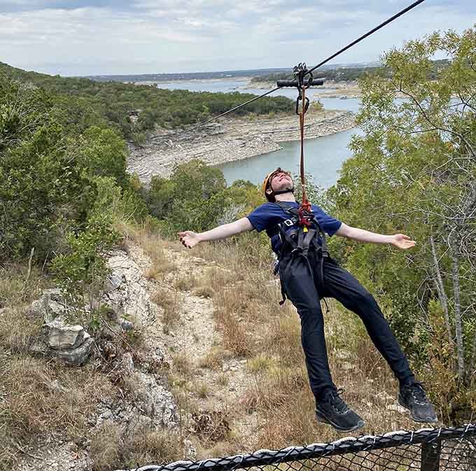 That face says it all: pure freedom, absolute joy, and the realization that you're actually flying over Texas.