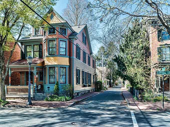 These colorful Victorian homes lining the street look like they escaped from a particularly cheerful period drama series.