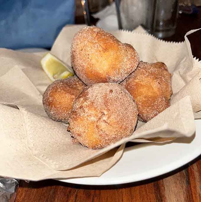 Golden ricotta doughnuts dusted with cinnamon sugar. Sweet pillows of fried perfection with Meyer lemon brightness.
