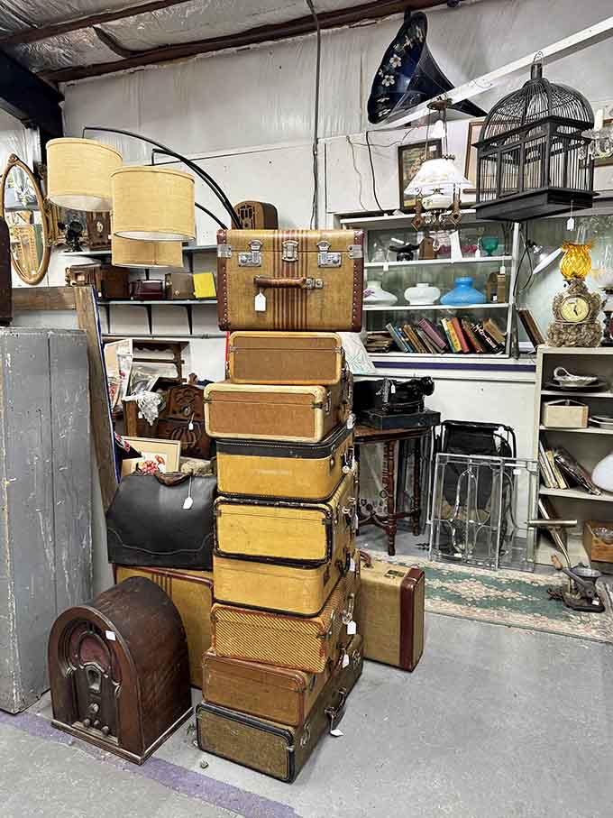 Stacked vintage suitcases tell stories of journeys taken before TSA made us remove our shoes at airports.