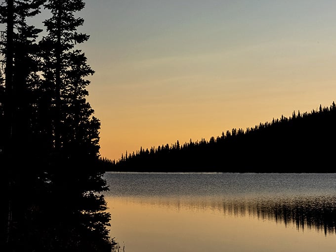 Sunset here paints the lake gold, proving nature doesn't need filters to look absolutely stunning.