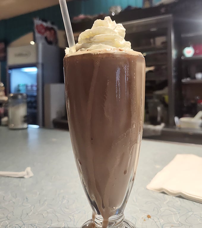That straw is standing at attention because this shake is thicker than a phone book from 1955.