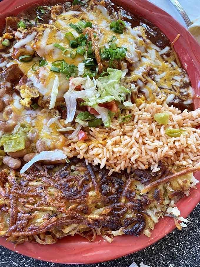 Hash browns get the gourmet treatment here, crisped to golden perfection alongside chilaquiles that'll haunt your dreams forever.