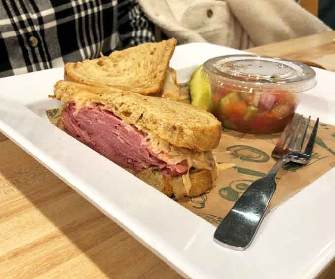 That golden-grilled marble rye holds together layers of deli perfection, served with fresh salsa that adds unexpected brightness to every bite.