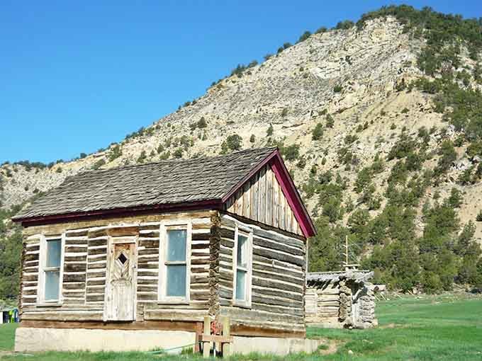 This weathered cabin tells stories of Colorado's past better than any history book ever could, standing strong against the mountains.